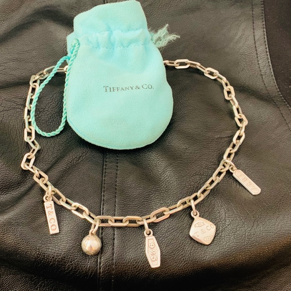 Tiffany & Co. | Jewelry | Tiffany Co Retired Charm Necklace | Poshmark